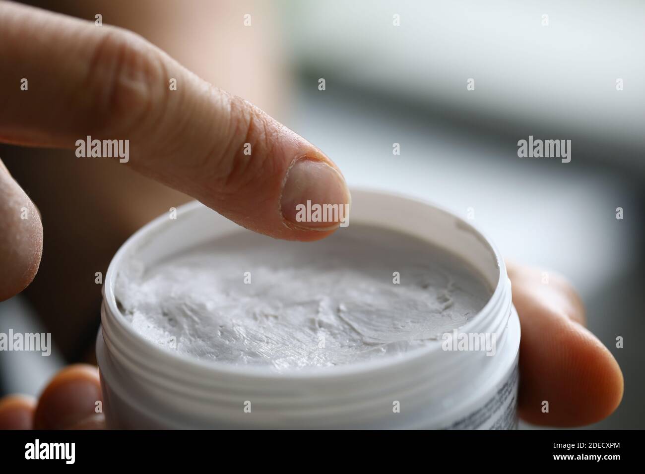 Man apply cream hair hi-res stock photography and images - Alamy