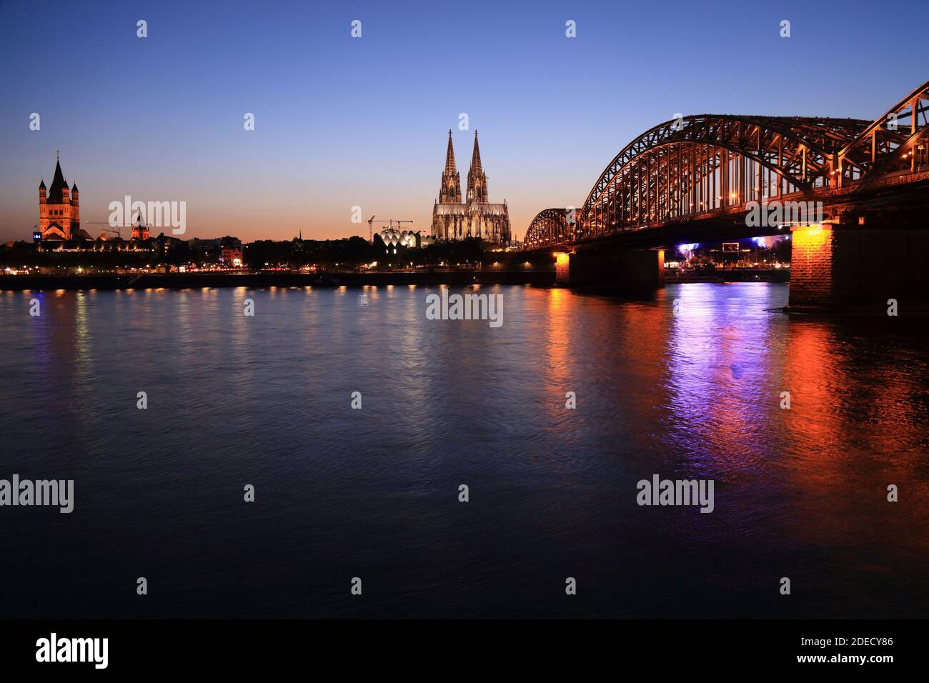 Cologne city night skyline, Germany. Rhine river, Hohenzollern bridge ...