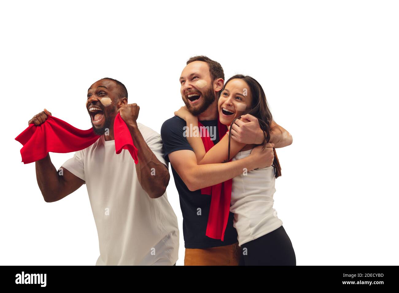 Happiness. Multiethnic soccer fans cheering for favourite team with ...