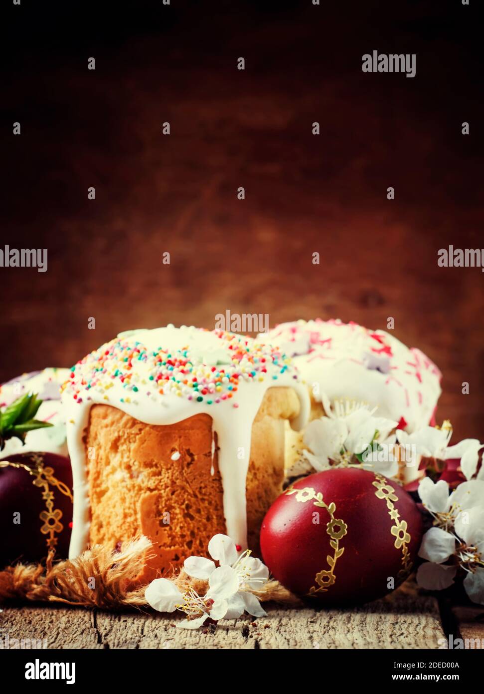 Traditional Russian Easter cakes kulich, with colored red eggs, vintage ...