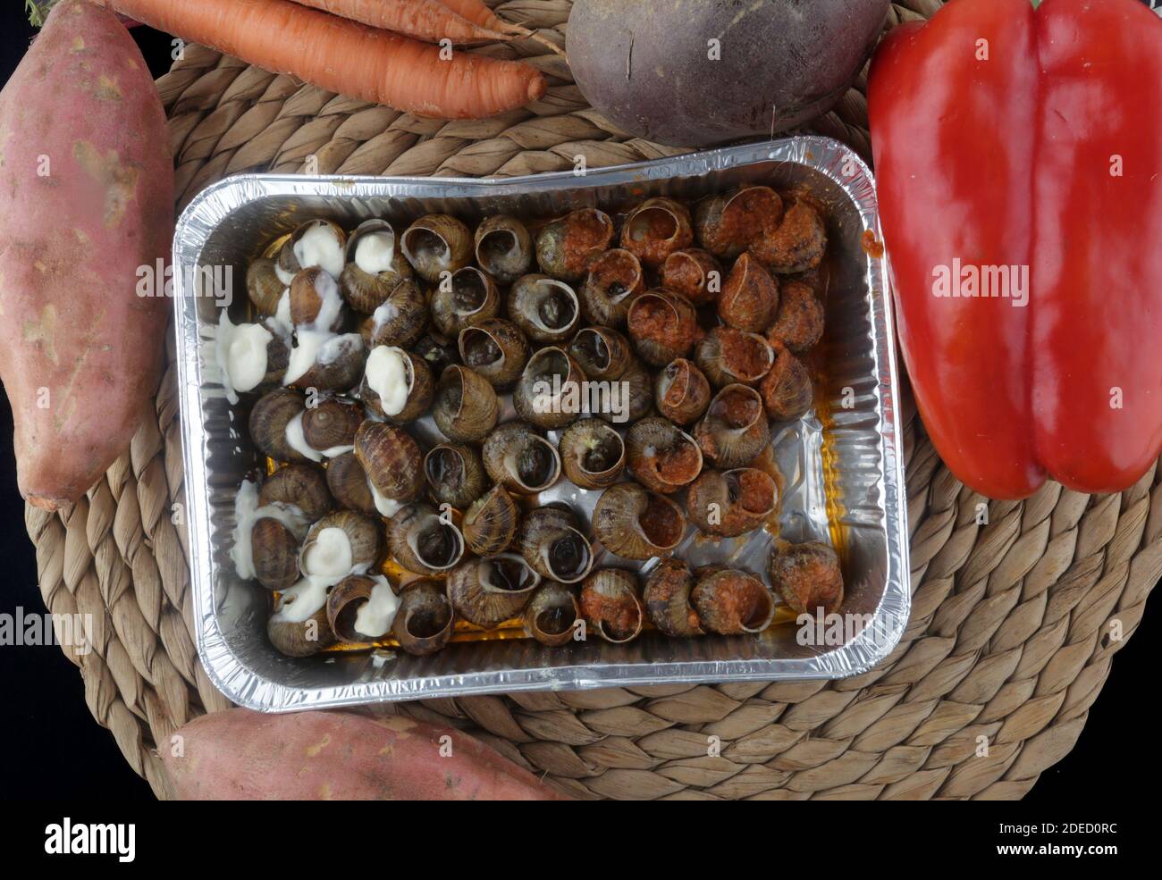 Snails food meal dinner lunch hi-res stock photography and images - Alamy