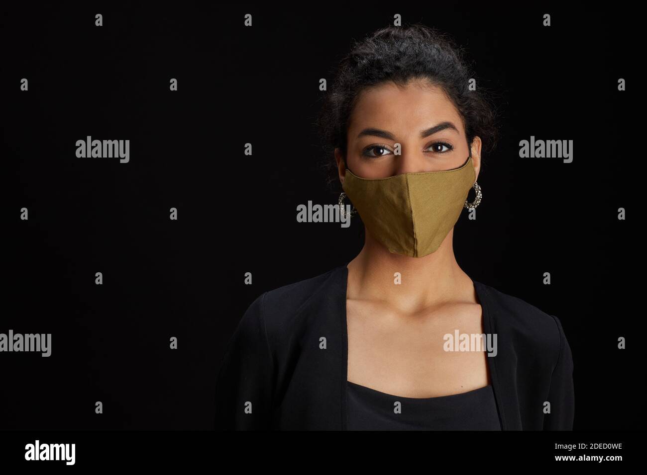 Close up portrait of elegant Middle-Eastern woman wearing face mask ...