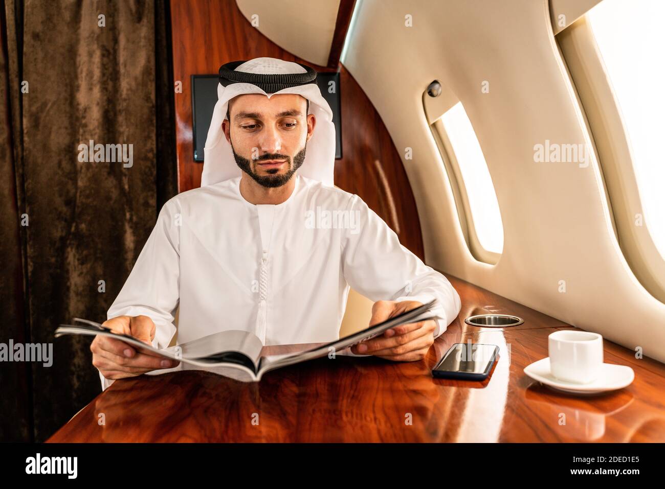 Arabic man wearing kandora in emirates style flying on exclusive ...