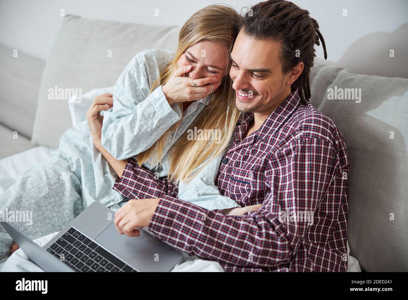 Couple watching movie cuddle hi-res stock photography and images - Alamy
