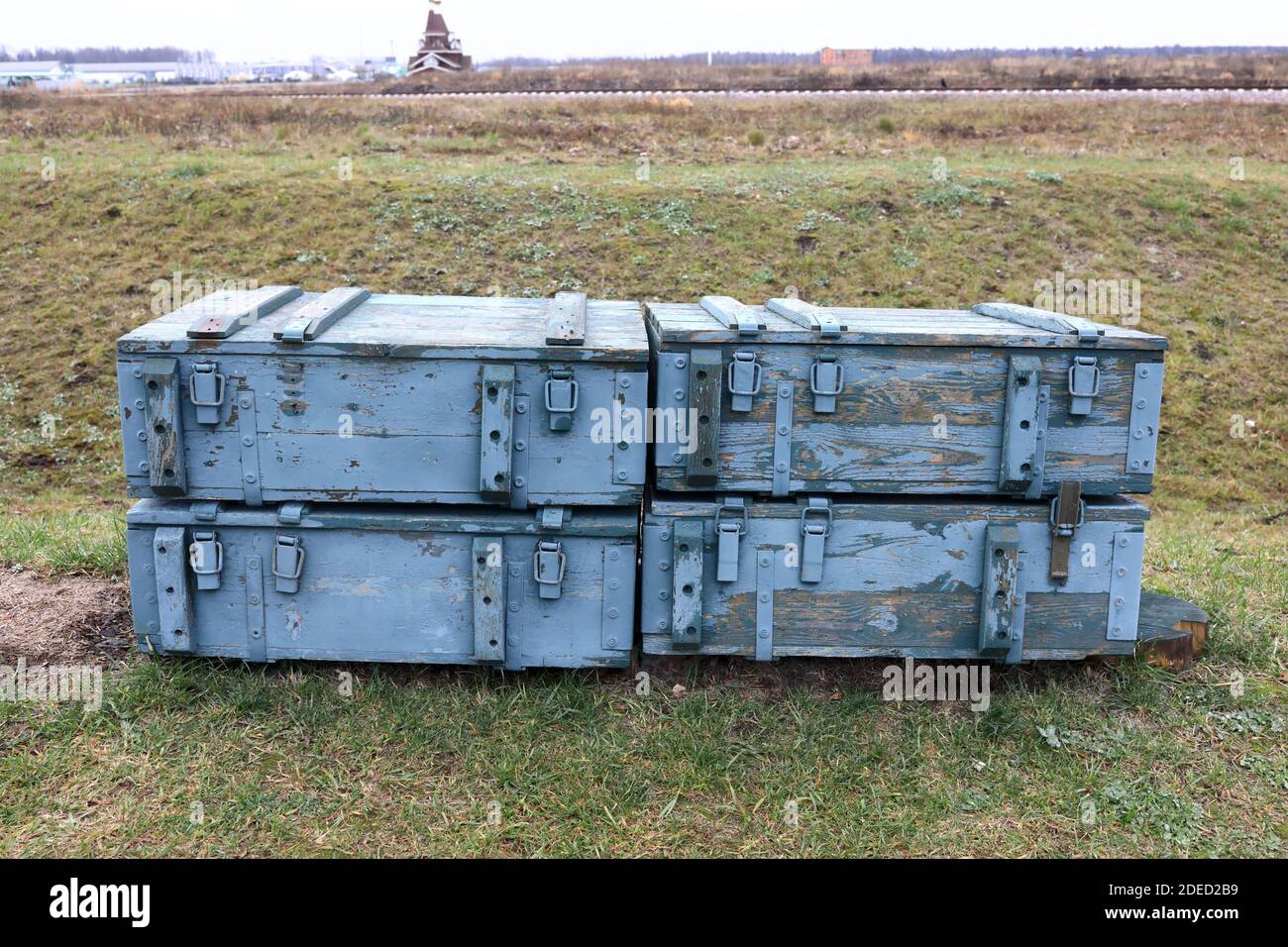 Wooden boxes with artillery shells on field Stock Photo - Alamy