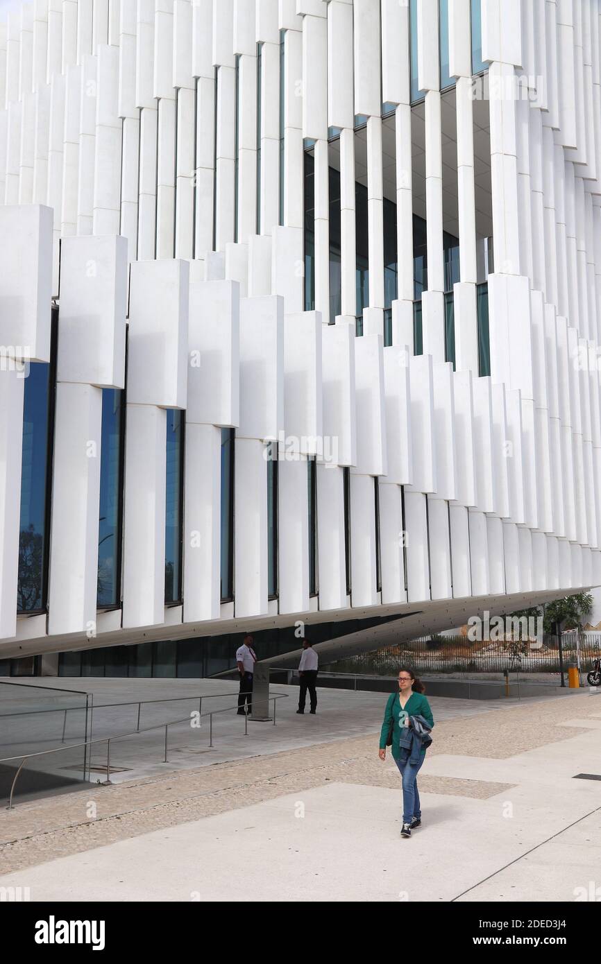 LISBON, PORTUGAL - JUNE 6, 2018: People walk by EDP Energias de ...