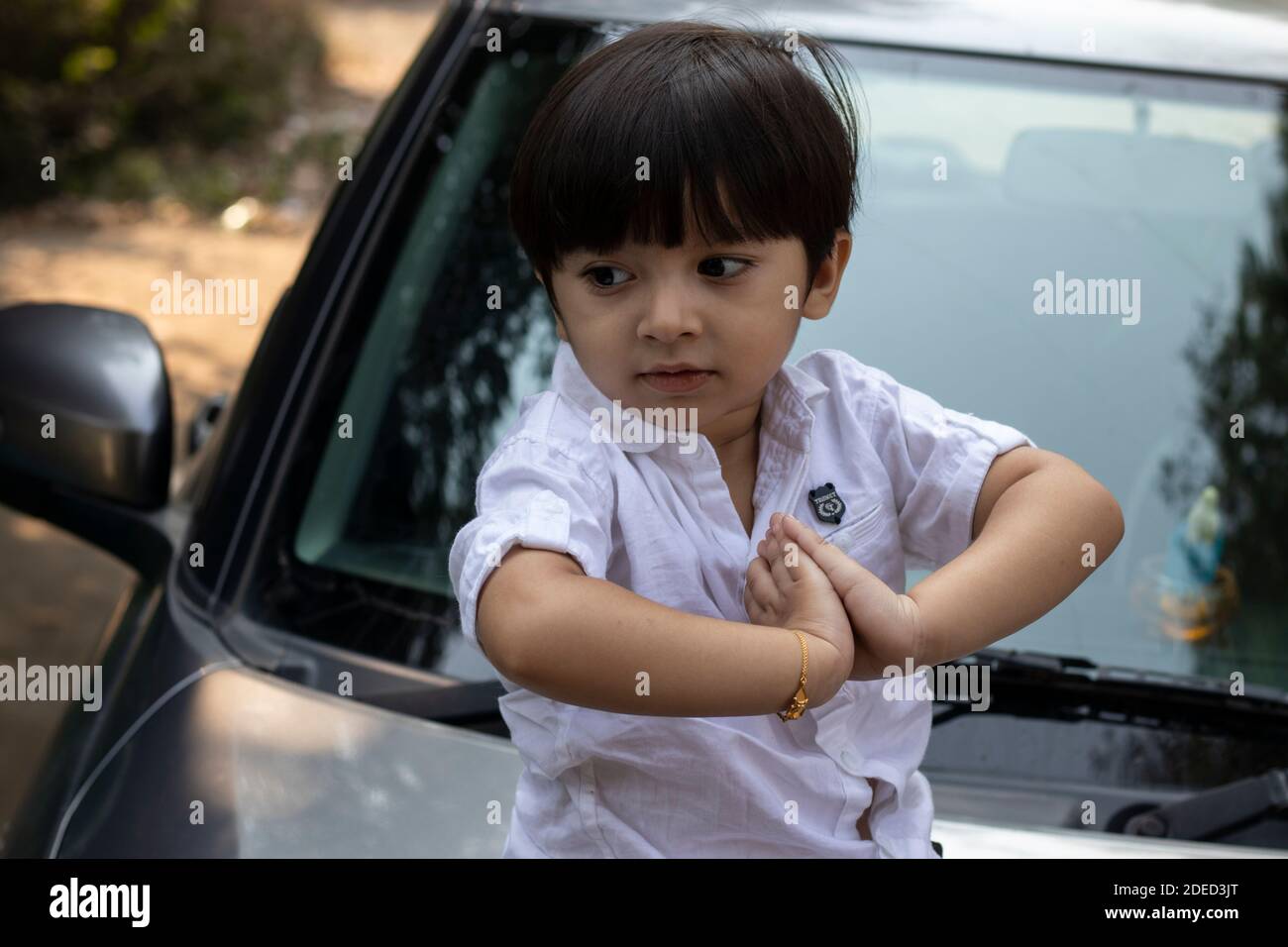 Girl sitting on car bonnet hi-res stock photography and images - Alamy