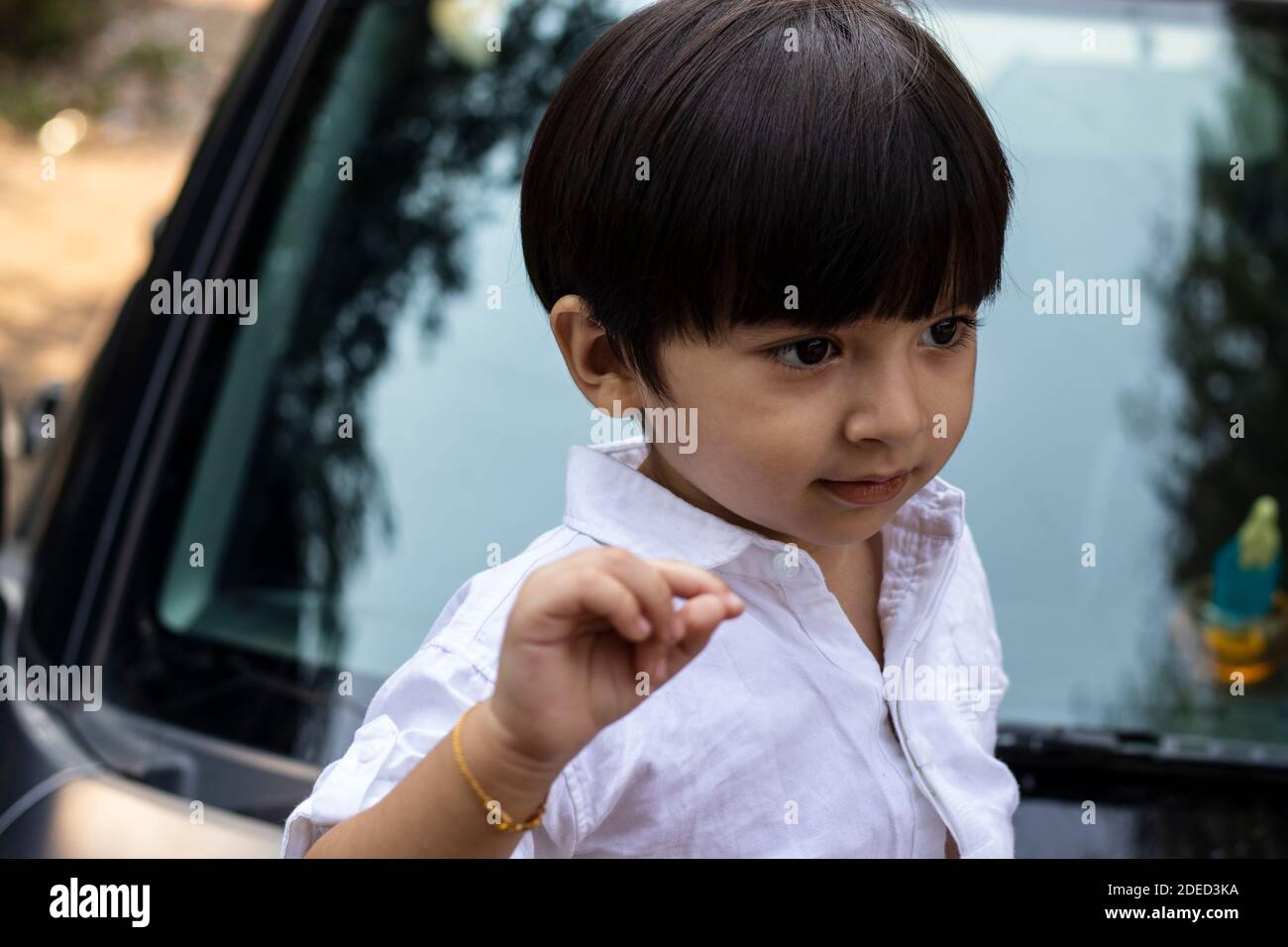 Indian boy by car hi-res stock photography and images - Alamy