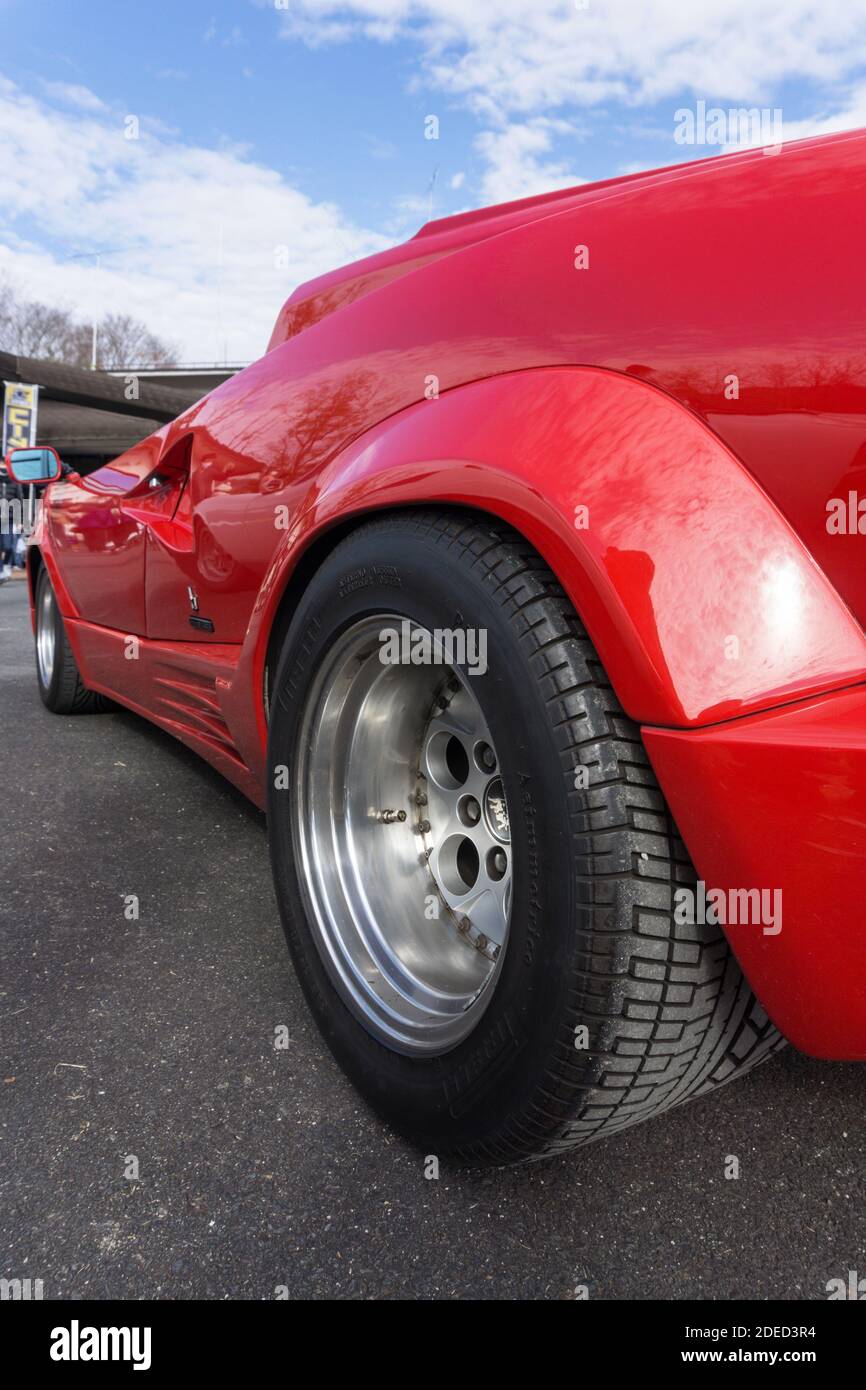 Close up detail of the left rear wheel and tyre of a red Lamborghini ...