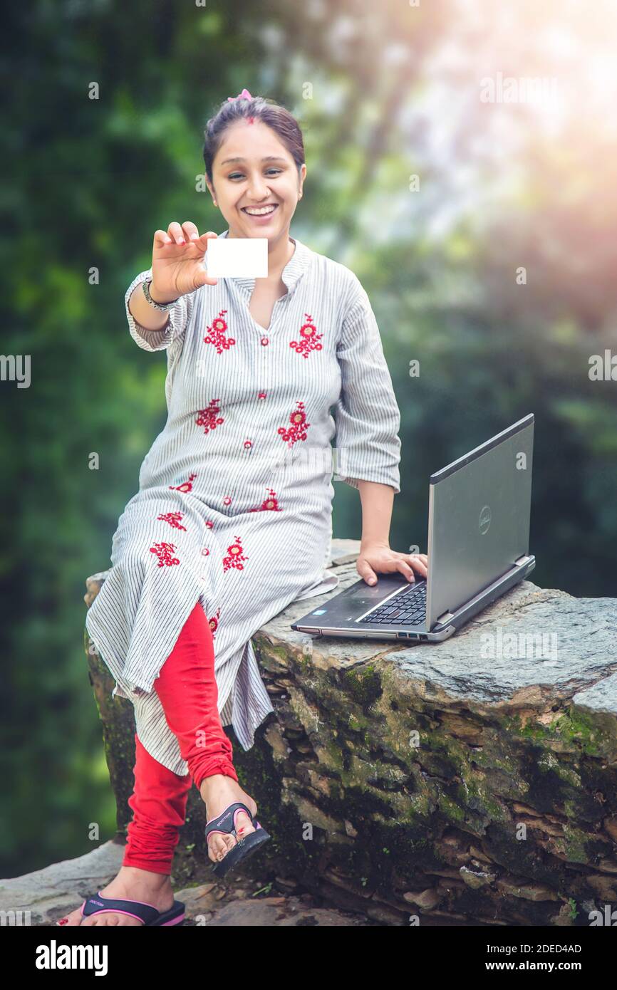 A Beautiful Young Indian Village Women Doing Online Shopping With Her 9523