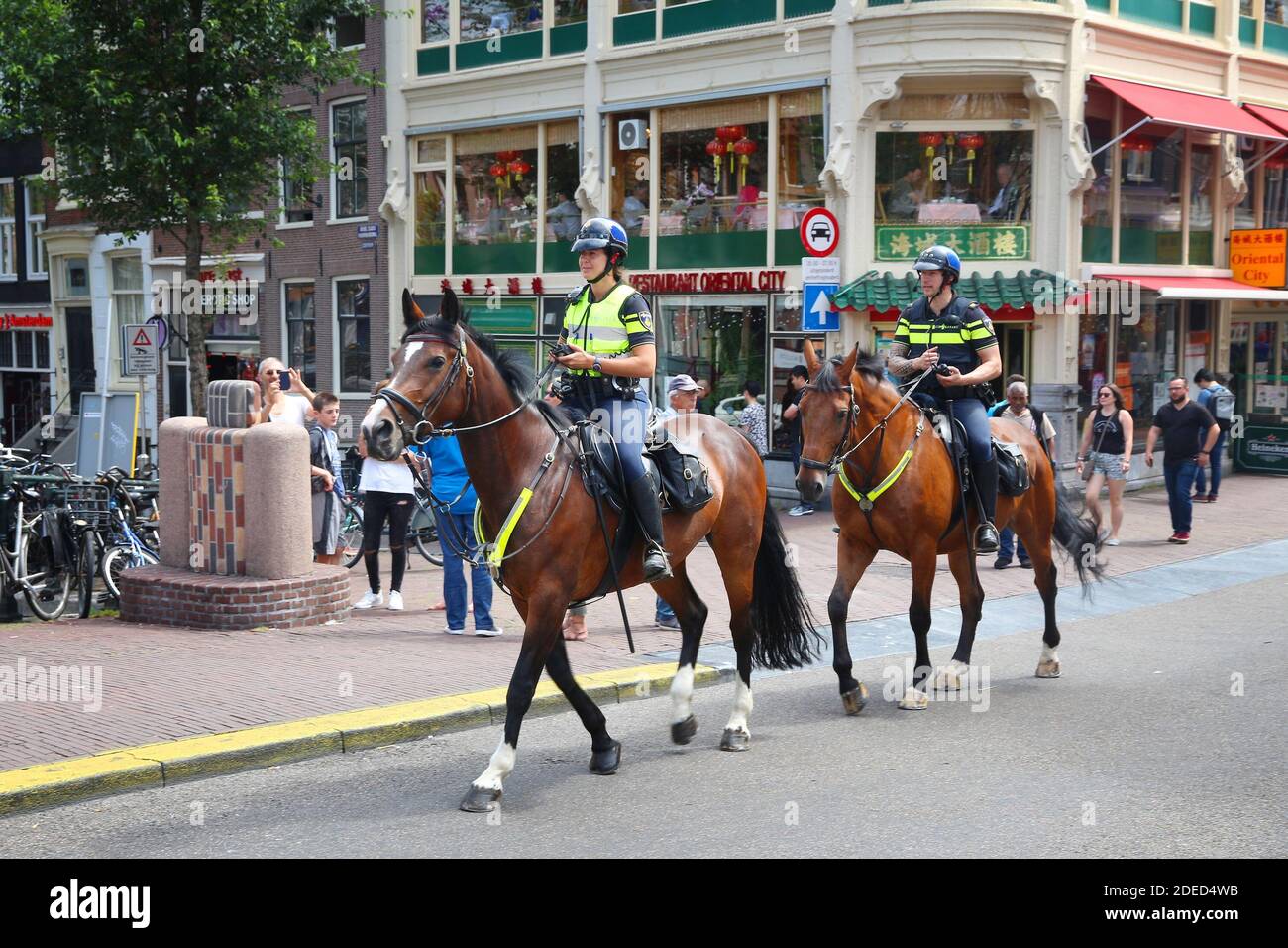 AMSTERDAM, NETHERLANDS - JULY 10, 2017: Equestrian police officers ...