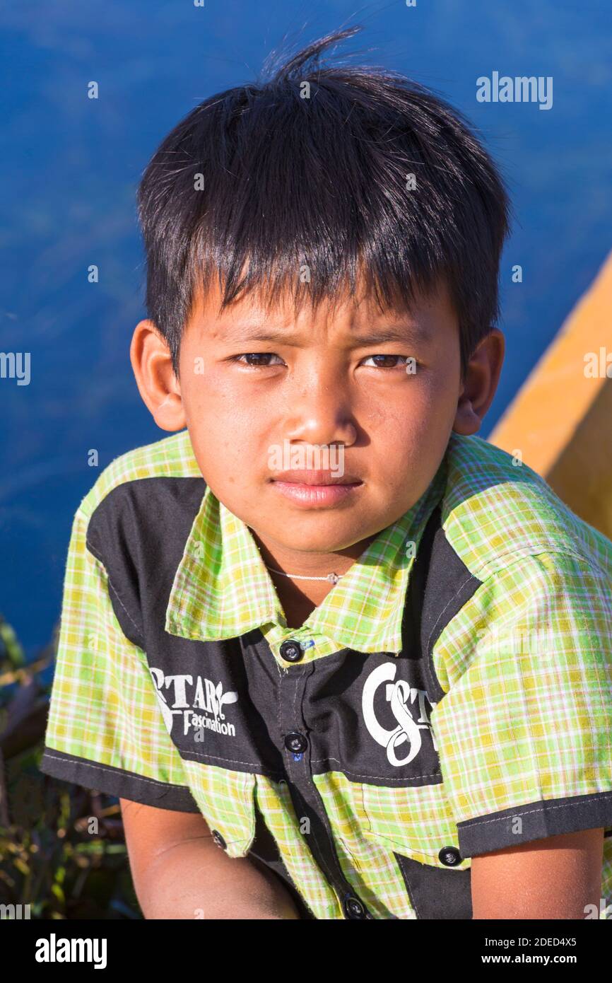 Burmese boy looking at camera at Shan State, Inle Lake, Myanmar (Burma ...