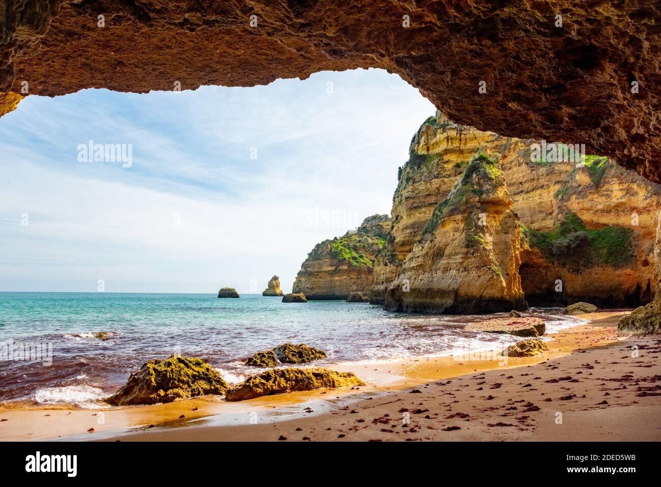 Natural caves and beach, Algarve Portugal. Rock cliff arches of Seven ...