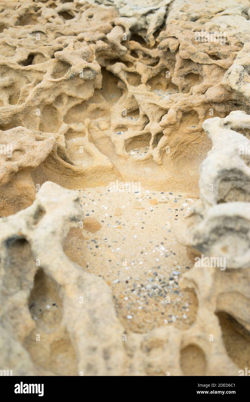 Sand and rock texture on the beach Stock Photo - Alamy