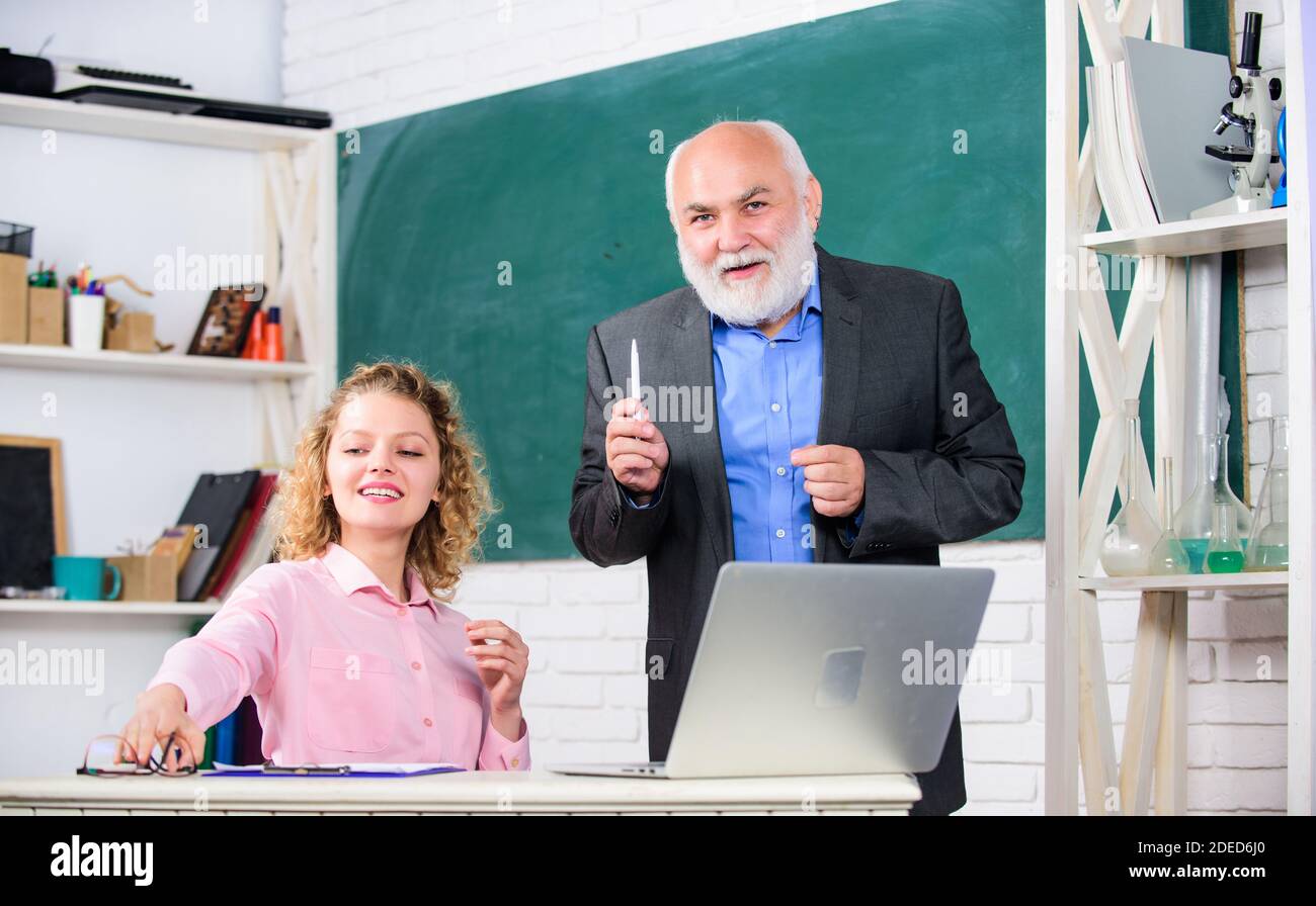 Caring teacher hi-res stock photography and images - Alamy