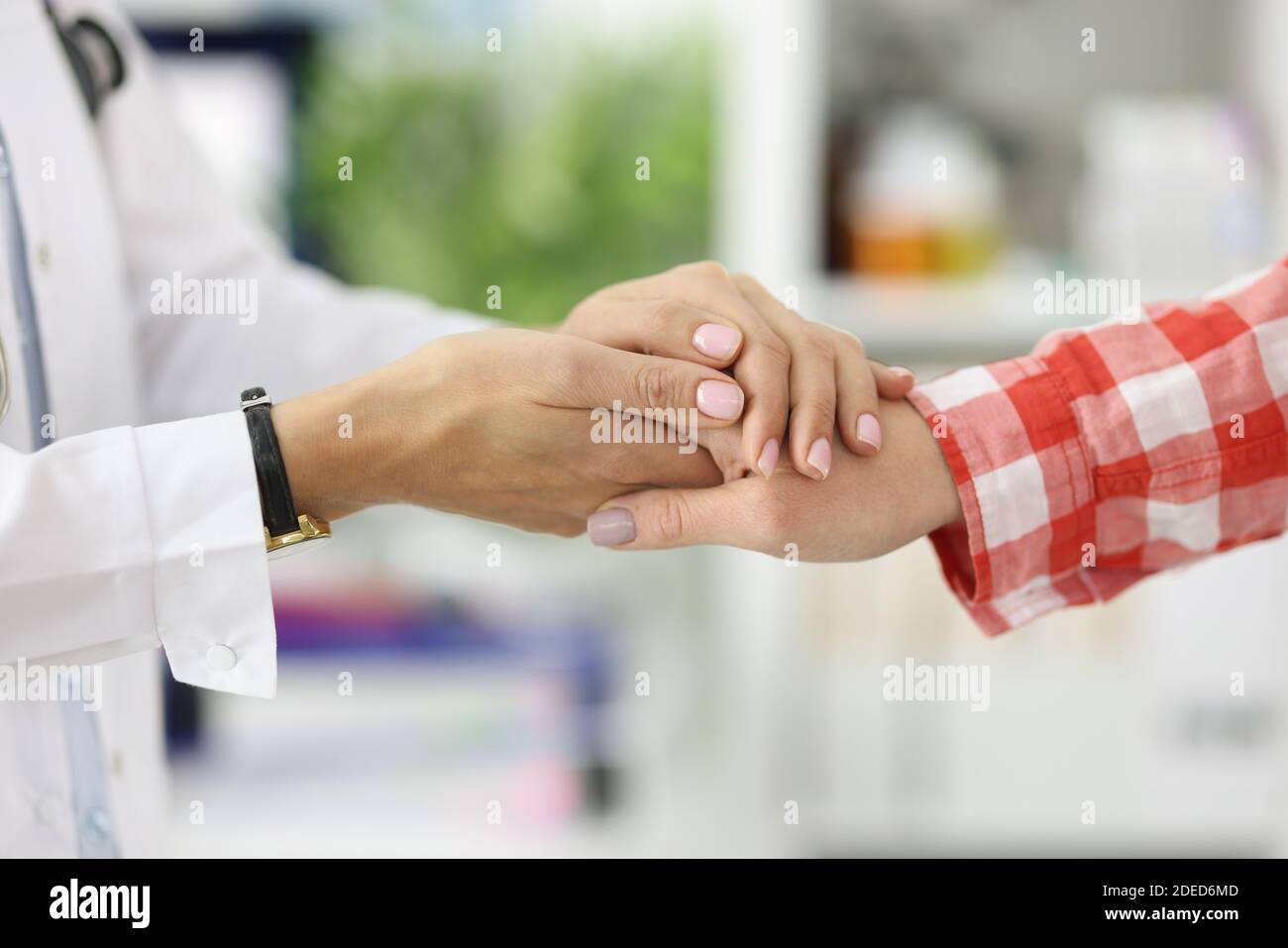 Handshake between doctor patient in hi-res stock photography and images ...