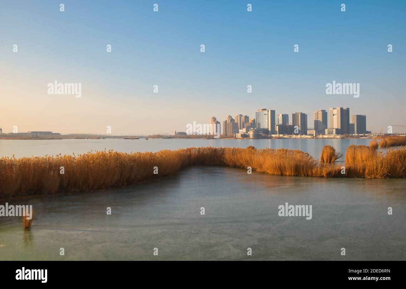 view of yinchuan new commercial district from a frozen lake Stock Photo ...