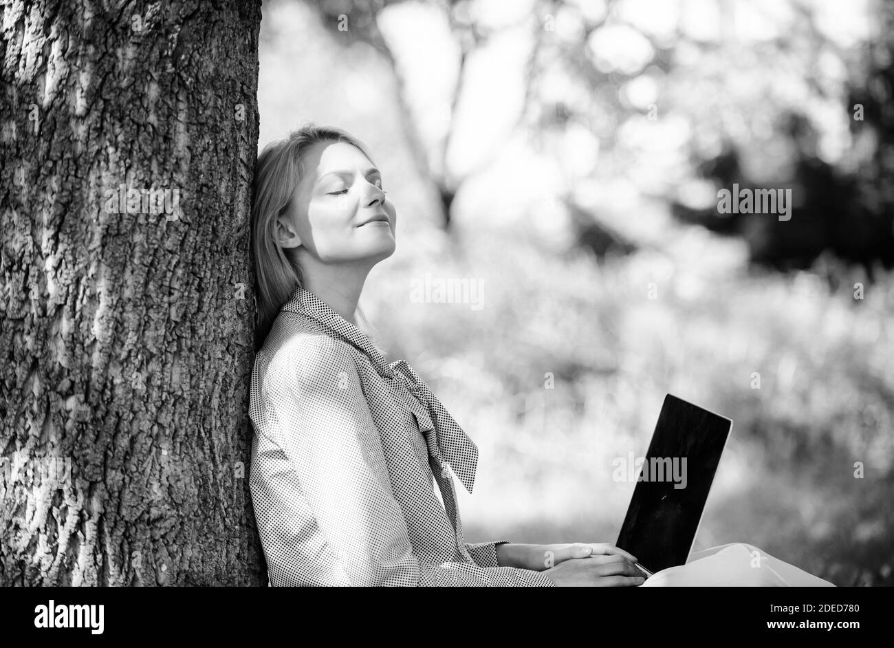 Natural environment office. Work outdoors benefits. Woman with laptop ...