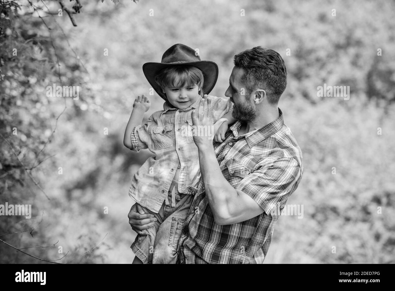 Ecology happy family day Black and White Stock Photos & Images - Alamy