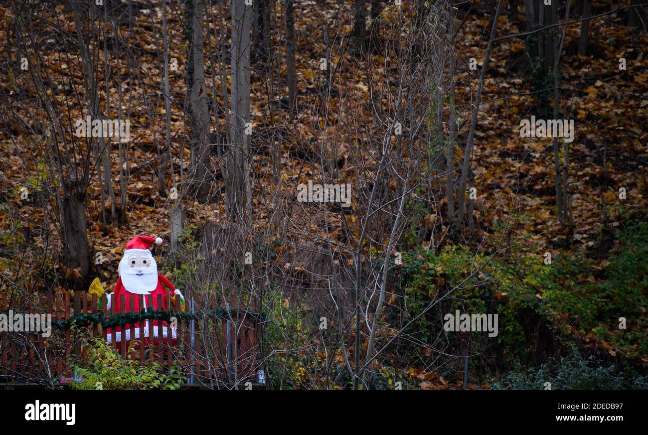 Dresden, Germany. 30th Nov, 2020. A Santa Claus figure stands on a ...