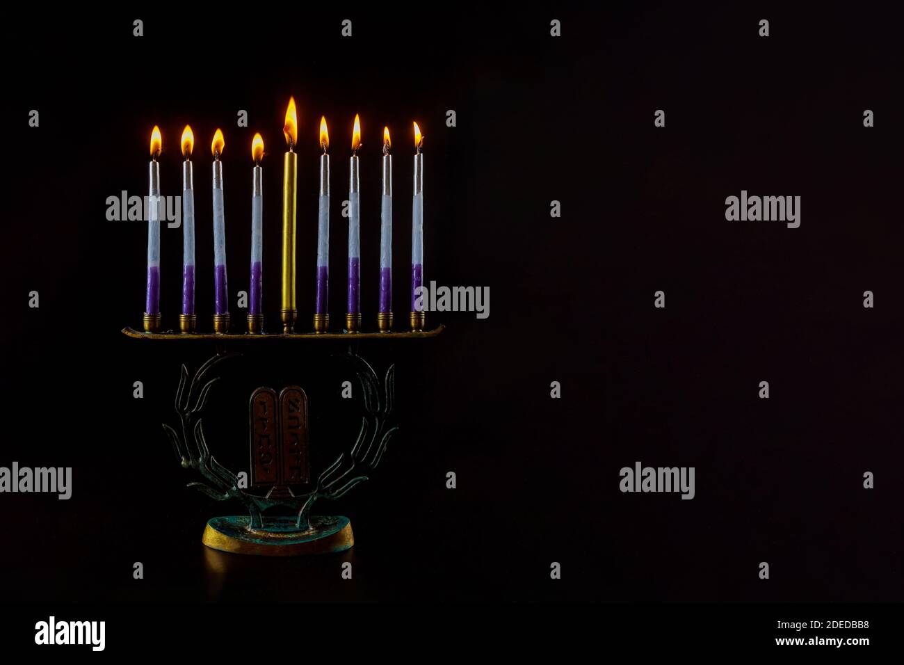 Jewish lights holiday of chanukah a burning menorah symbol of Judaism ...