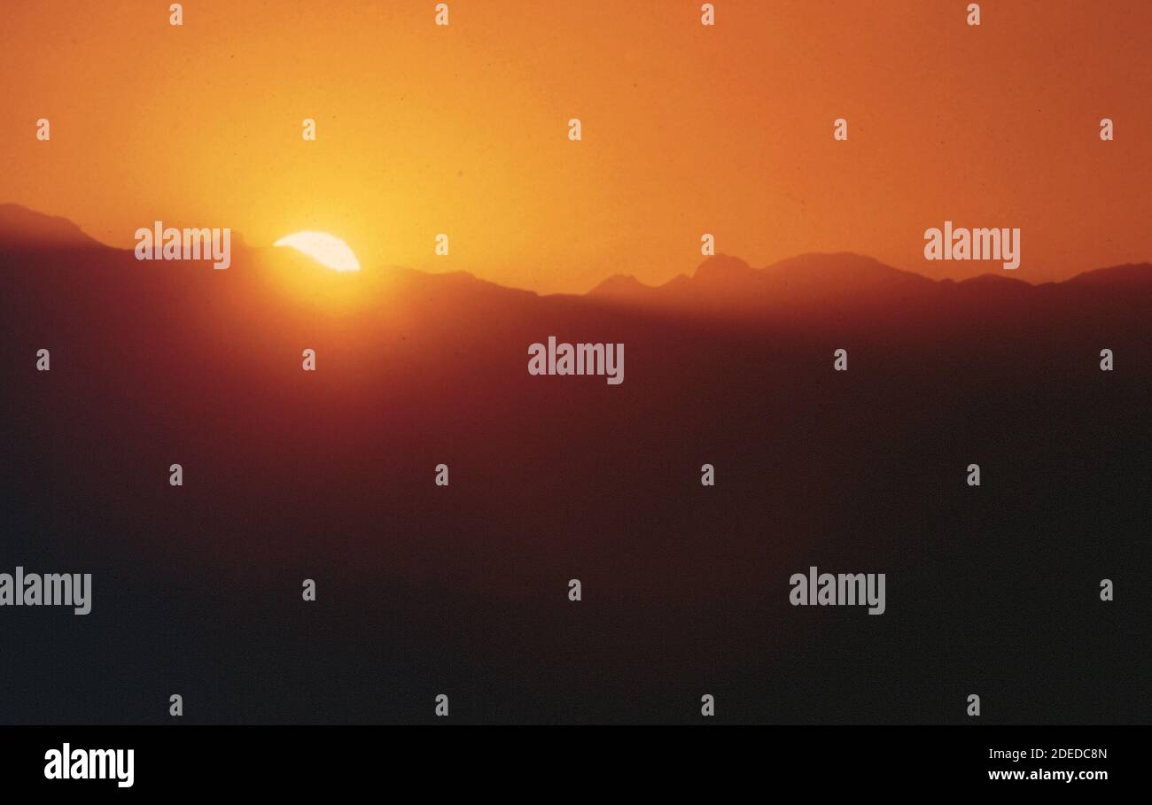 1970s sun over mountain hi-res stock photography and images - Alamy