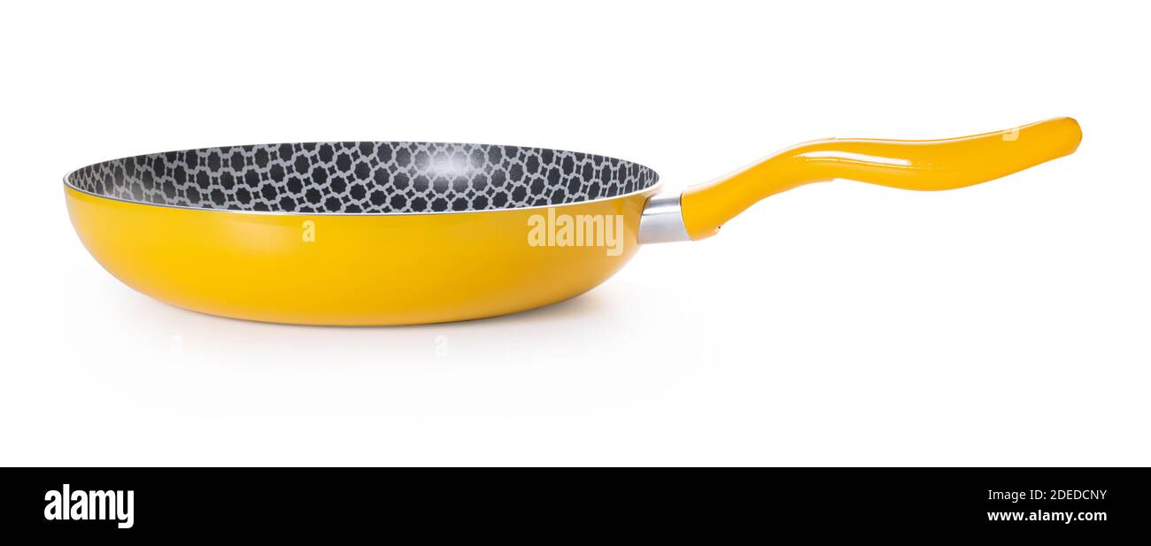 new yellow frying pan on white isolated background Stock Photo - Alamy