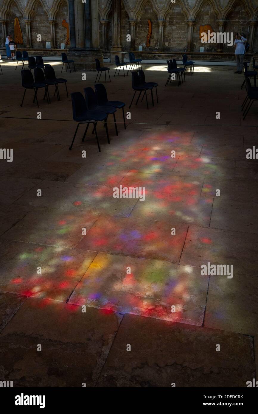 Stained glass window pattern lit up on the stone floor inside Lincoln ...