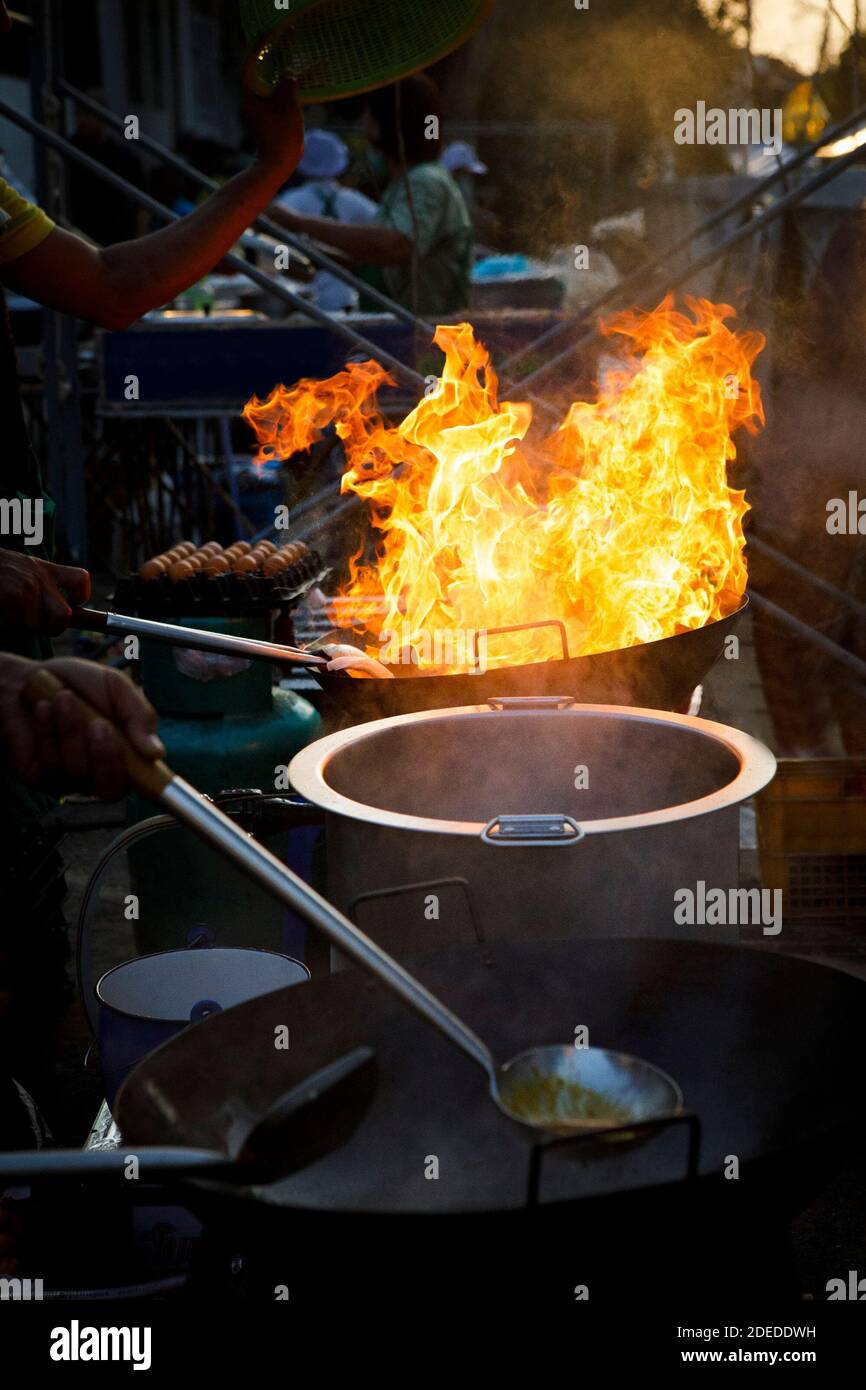 fire burning over street food cooking stove in bangkok thailand Stock ...