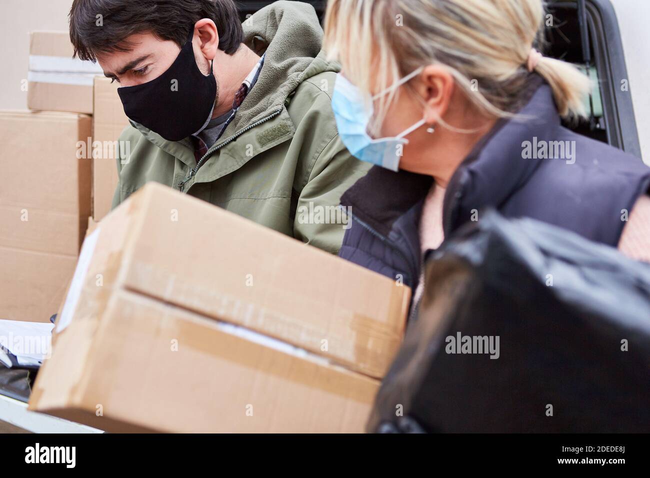 Collaboration of the parcel service team for the delivery of parcels at ...