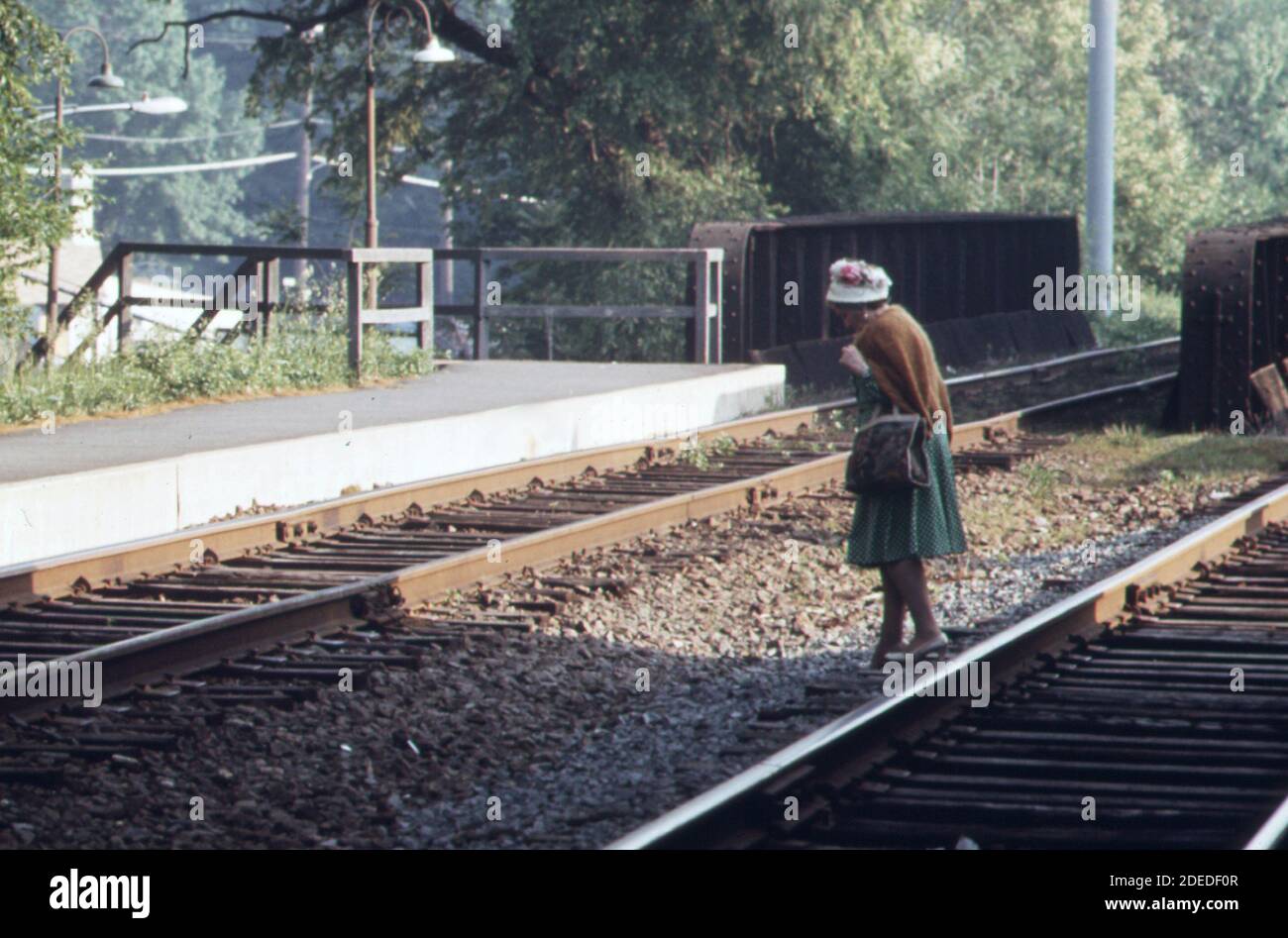 1970s woman crossing railroad tracks hi-res stock photography and ...