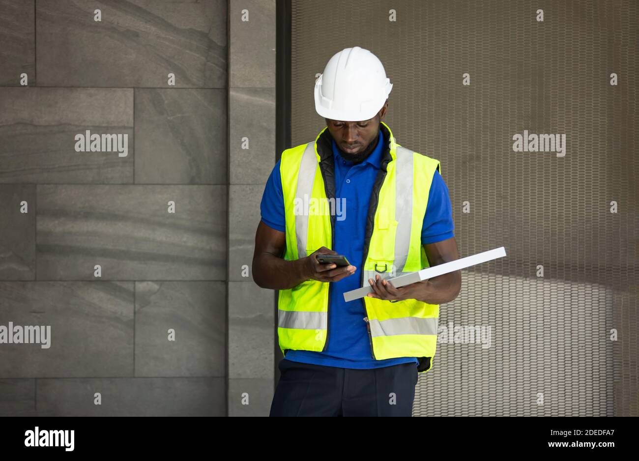 Technician checking on solar cell control panel Stock Photo - Alamy