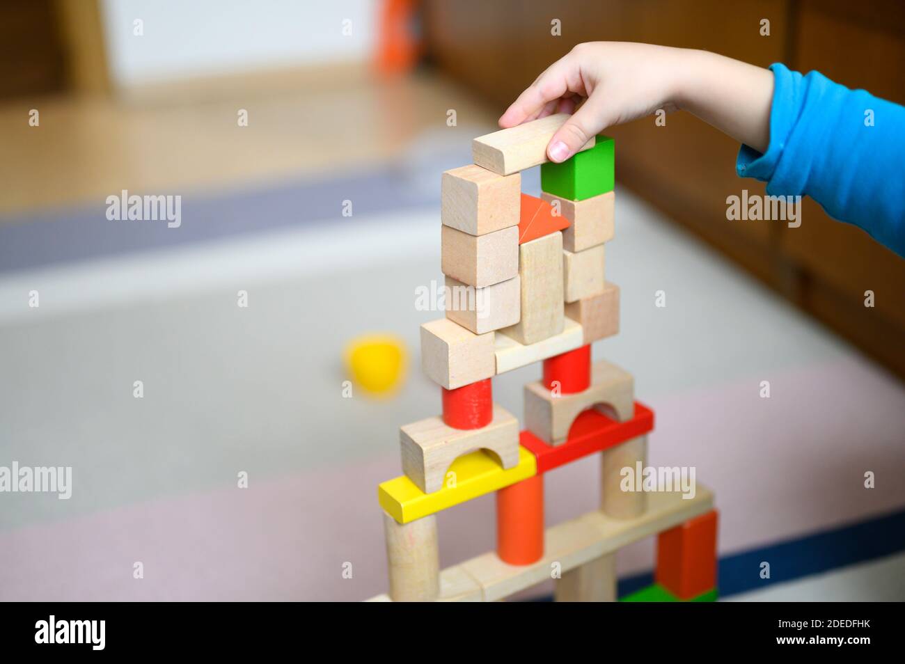 Kids building tower of blocks hi-res stock photography and images - Alamy
