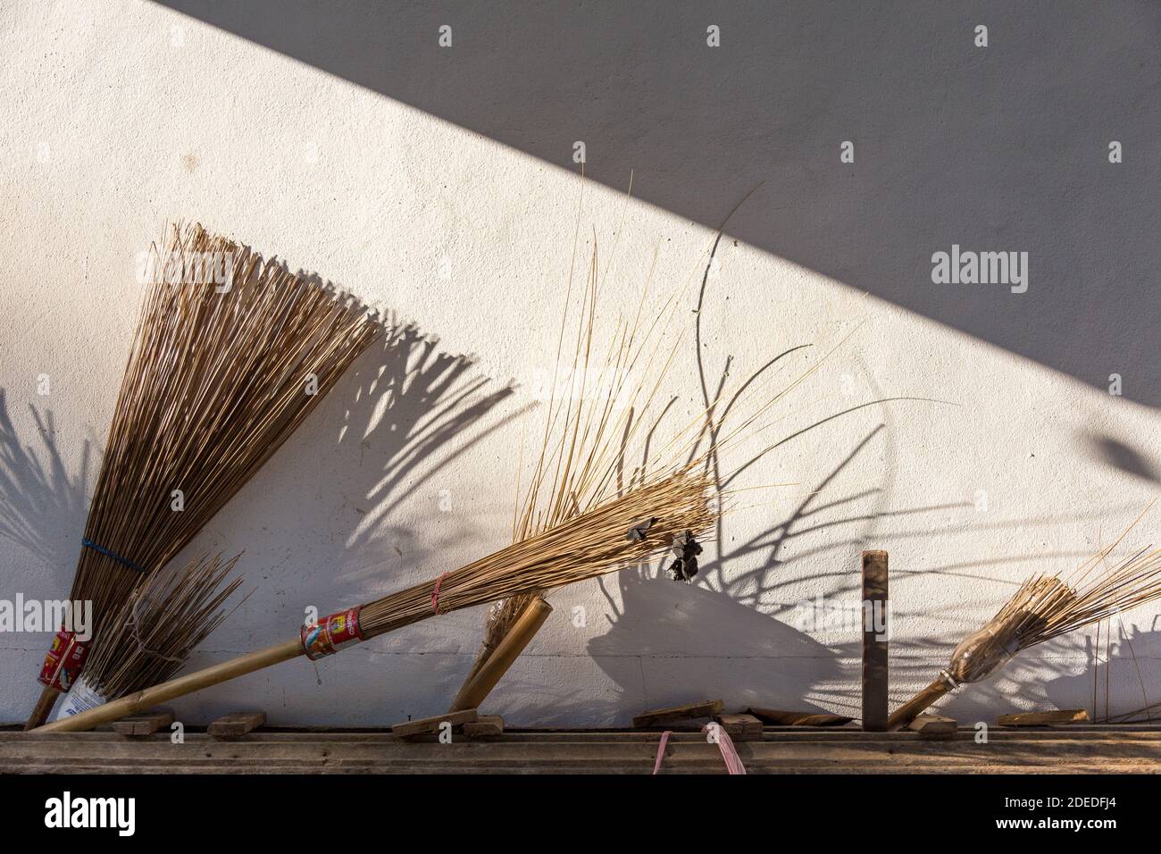 traditional stick beasom broom at monastery in sun with diagonal ...