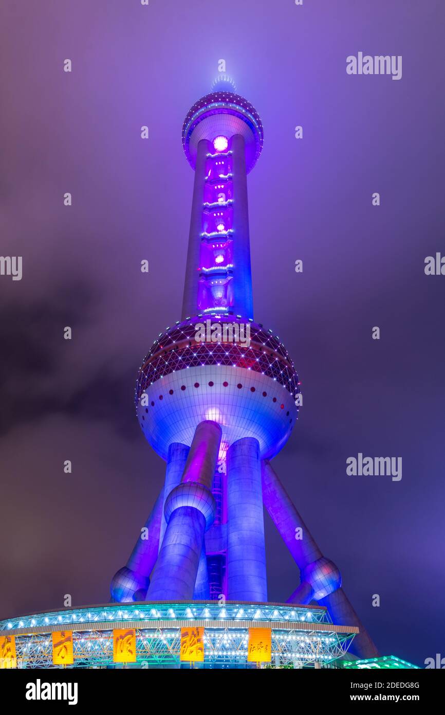 Night view of the The Oriental Pearl Tower at a cloudy day after ...