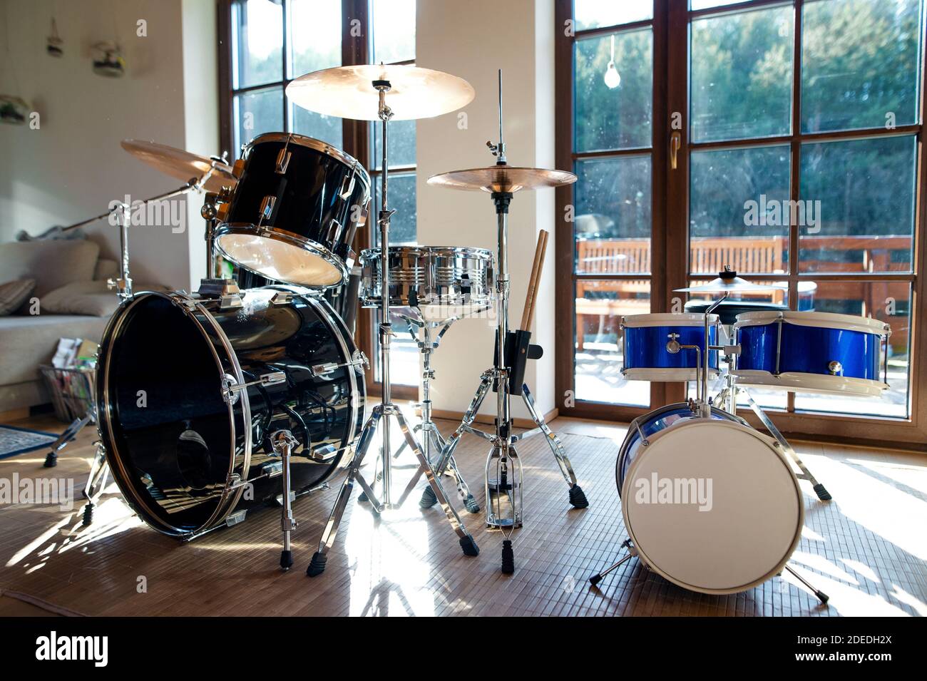 Set of drums indoors in living room in house, playing musical ...