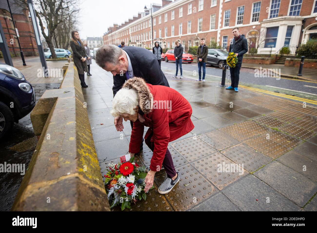Maura Babington, widow of James Henry Babington, lays a wreath with ...