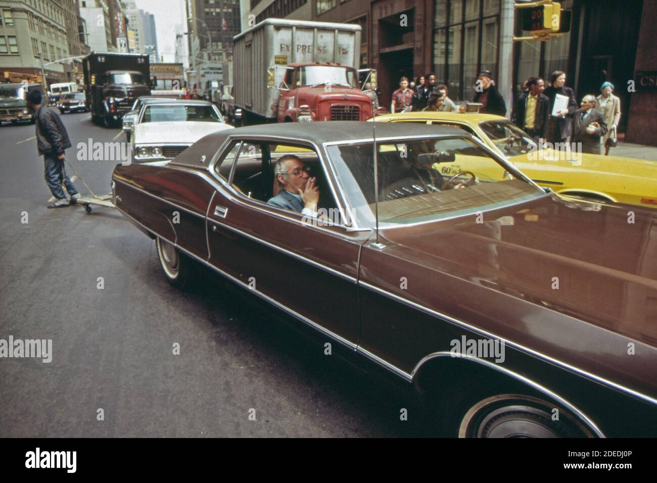 1970s Photo (1973) - Large car moves slowly through Manhattan traffic ...