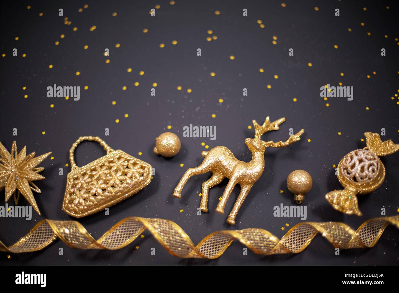 Beautiful Golden sparkling Christmas decoration on black Glitter ...