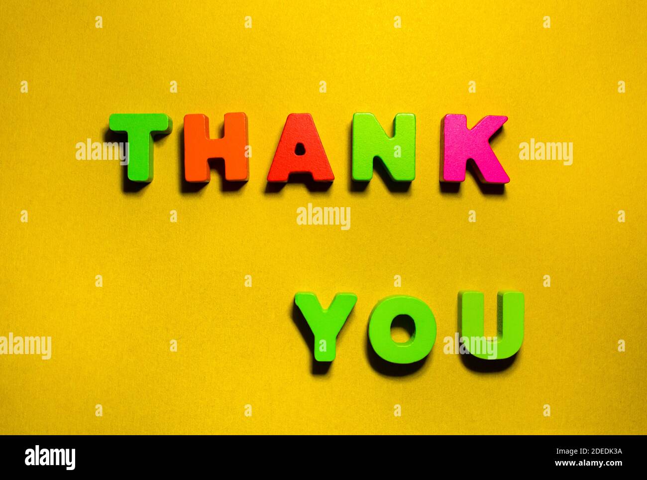 Word text Thank you inscription by wooden colorful crave letters at ...