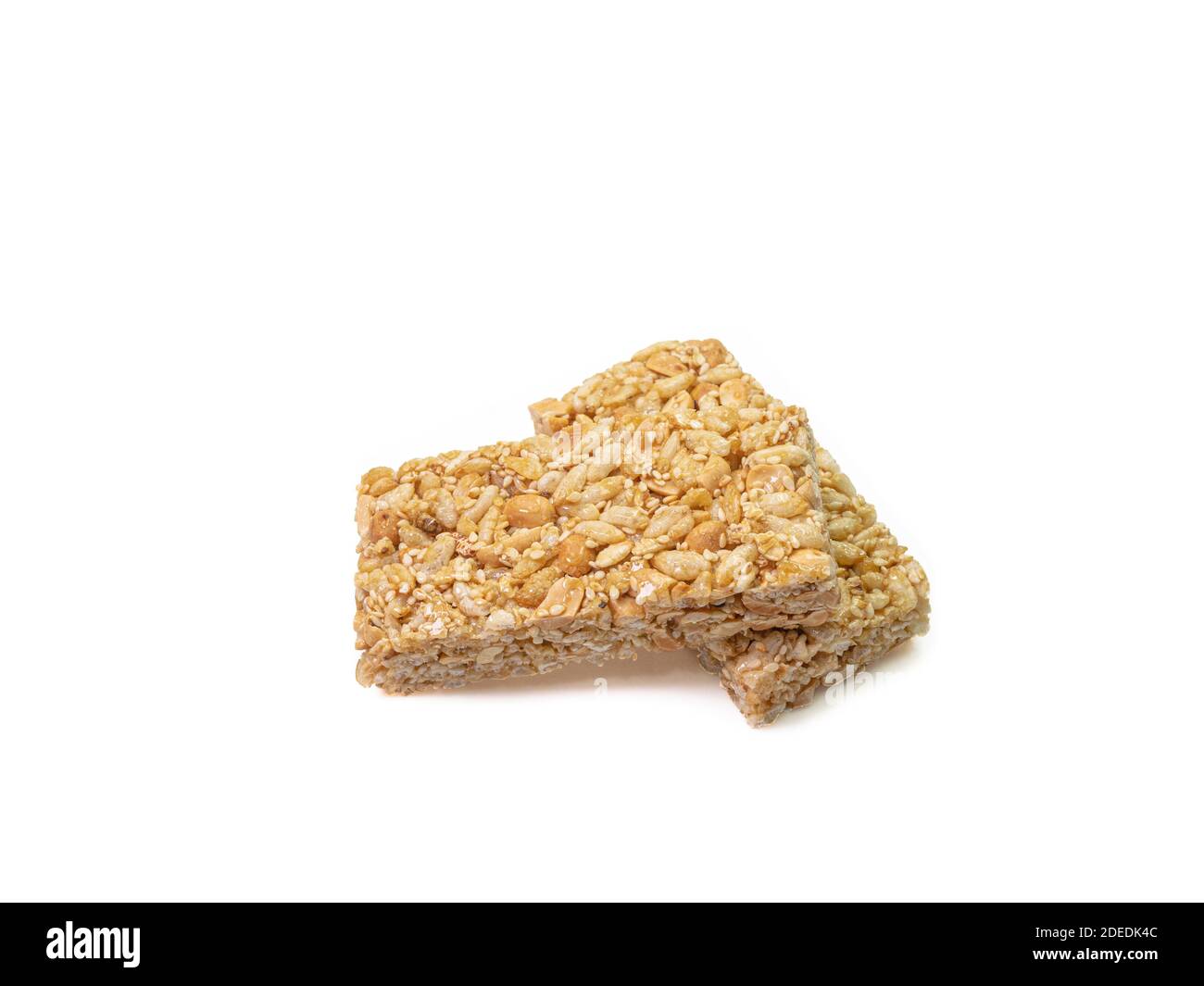 The close up of homemade Thai sweet cereal bar candy on white ...