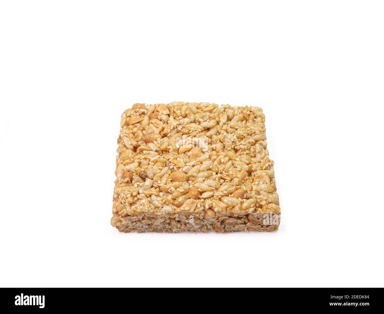 The close up of homemade Thai sweet cereal bar candy on white ...