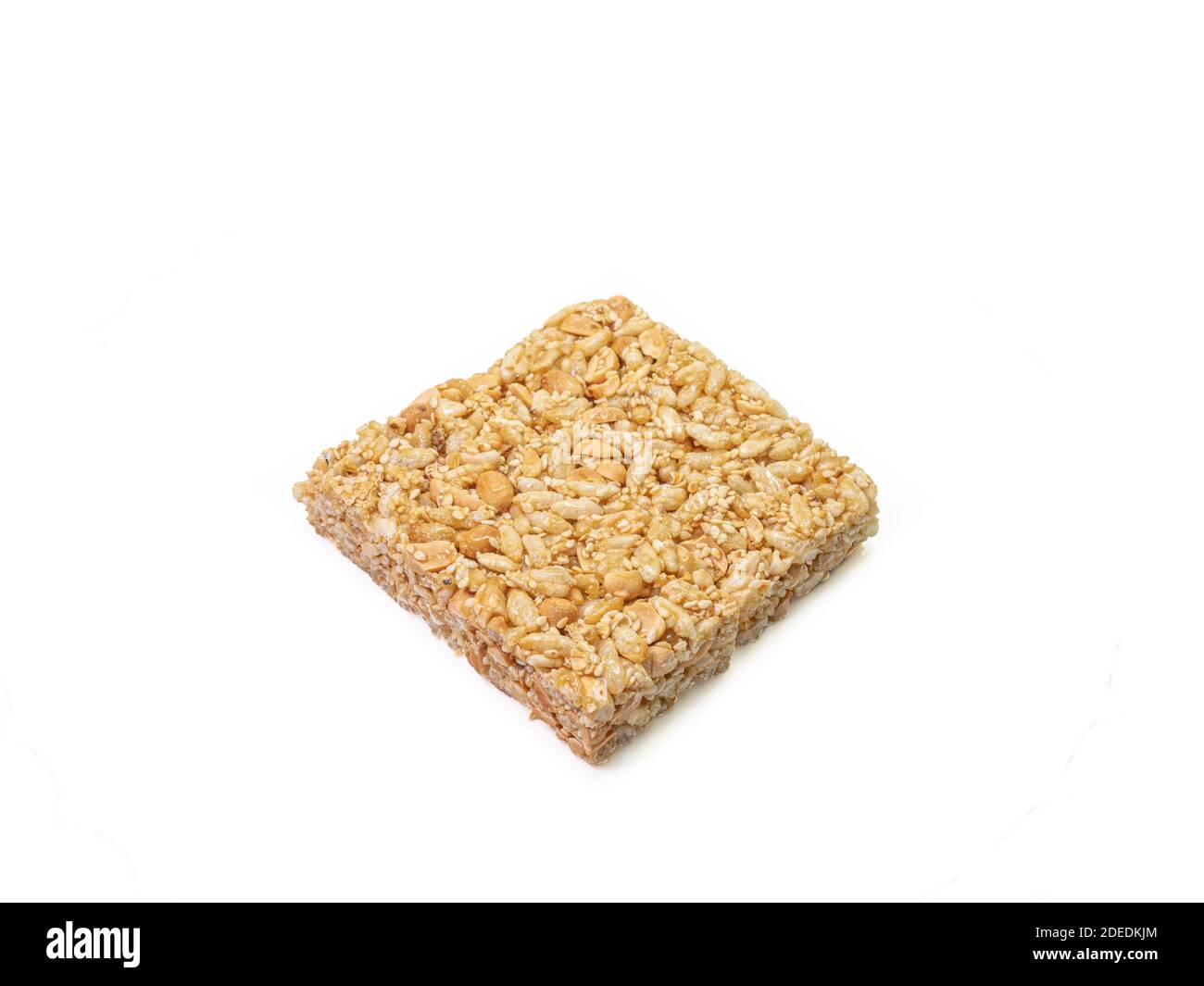 The close up of homemade Thai sweet cereal bar candy on white ...