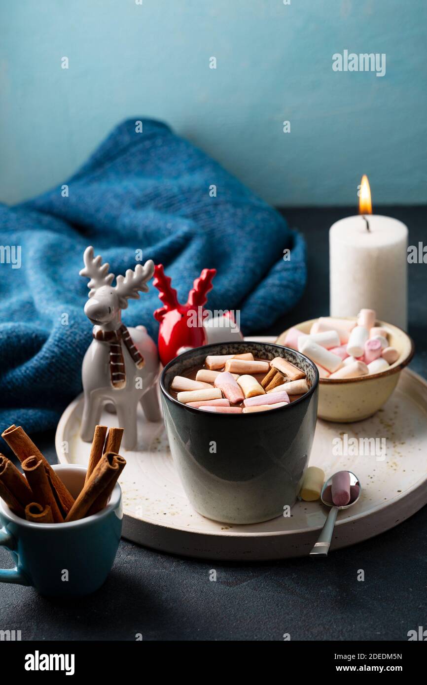 Hot winter chocolate in cup and Christmas deer Stock Photo - Alamy