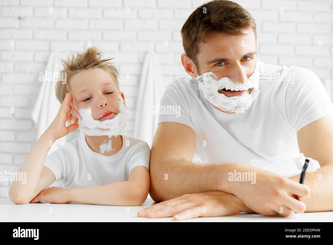 Father and his little son shaving together Stock Photo - Alamy