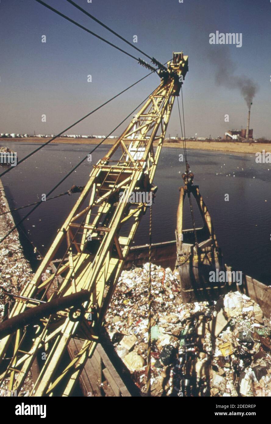 1970s Photo - (1973) - Unloading garbage scows at Staten Island. Carts ...