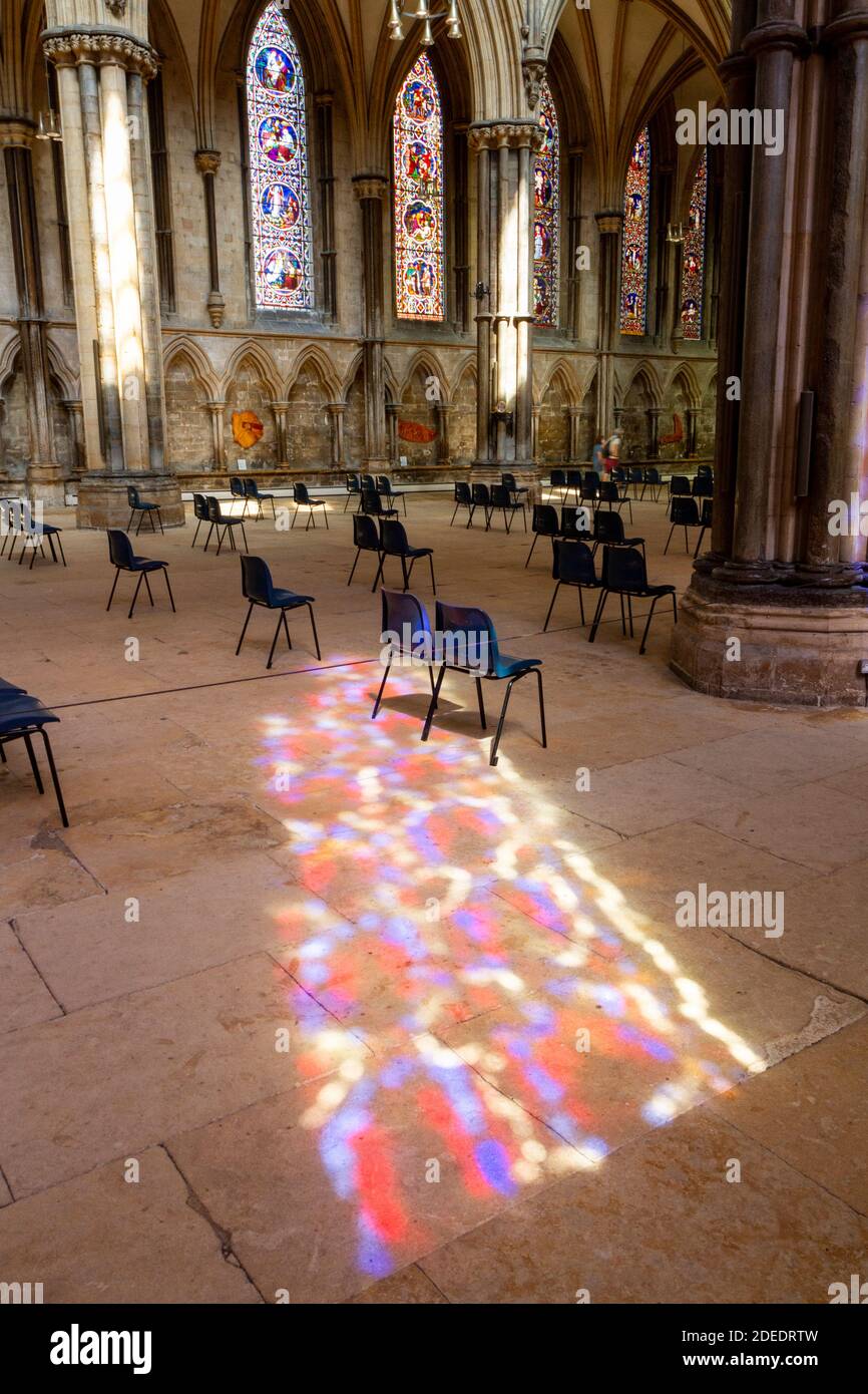 Stained glass window pattern lit up on the stone floor inside Lincoln ...