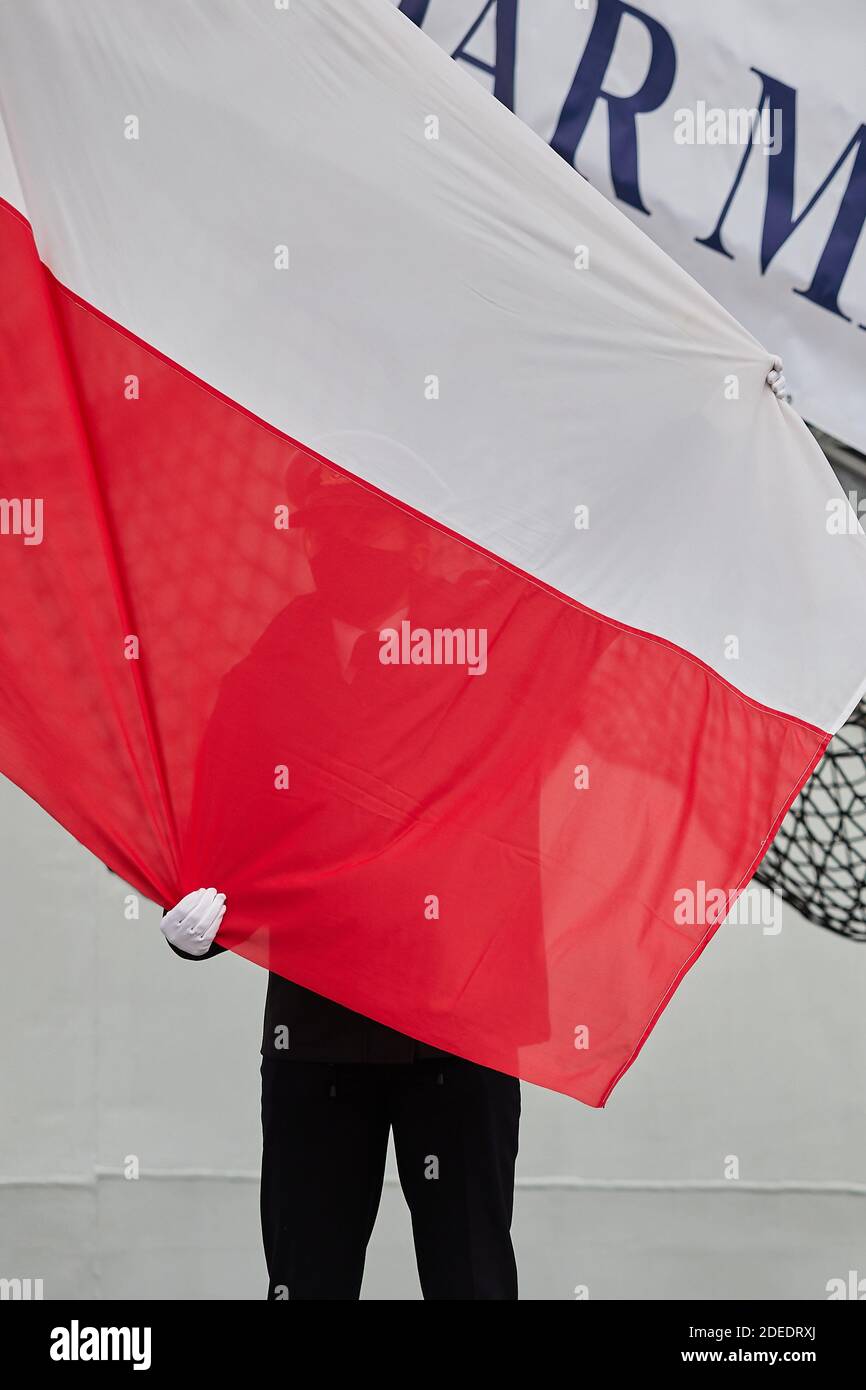 Sailor students raising the flag of Poland in Gdynia, northern Poland ...