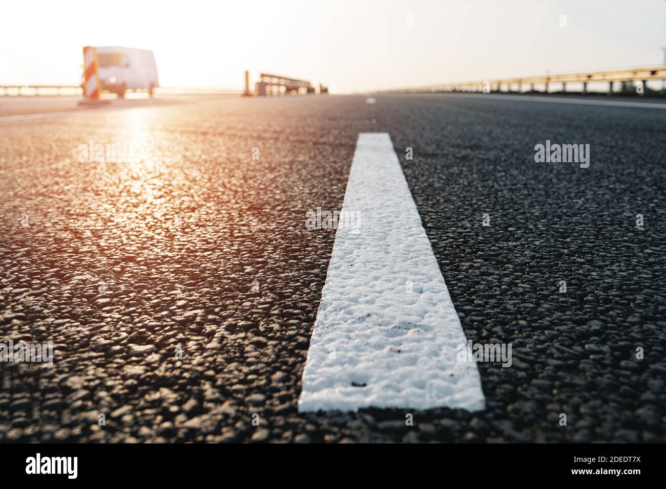 White marking line on asphalt road on highway Stock Photo - Alamy