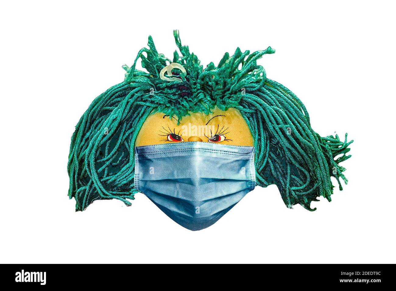 Front view shot of girl doll with angry expression isolated on white ...